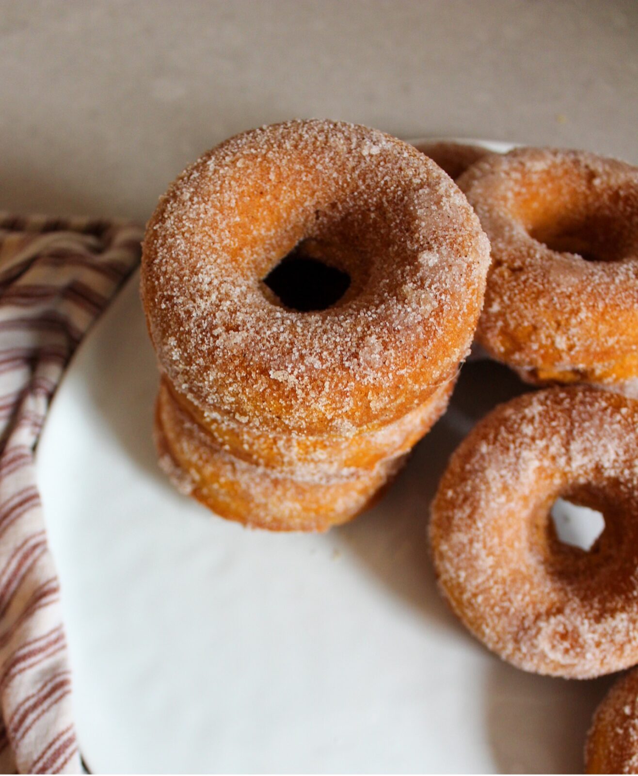 Indulge in the Fall Season with Homemade Baked Pumpkin Spice Donuts ...